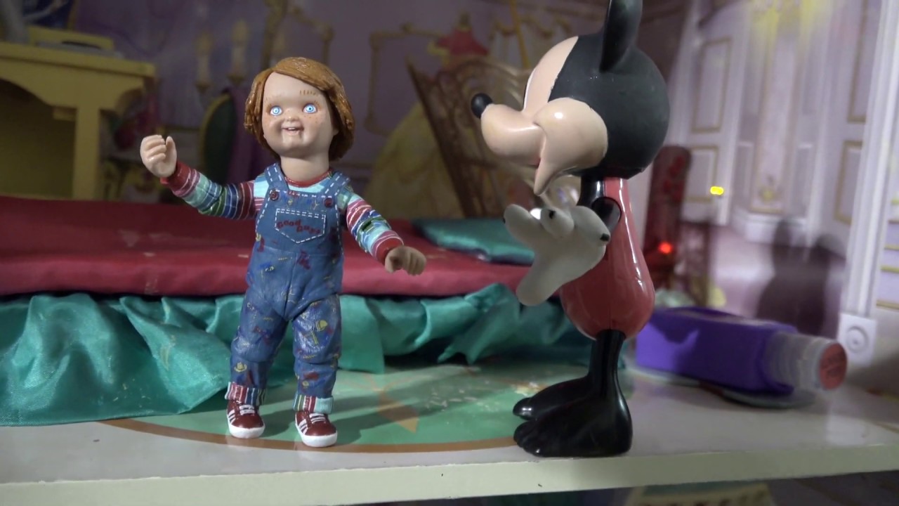 chucky and mickey mouse are pretending to fight and play - YouTube