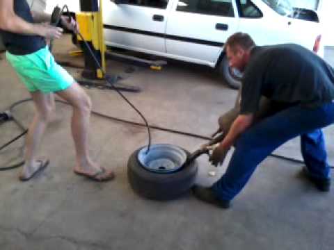 195/55 R13 tire stretching on a 8" banded steel - YouTube