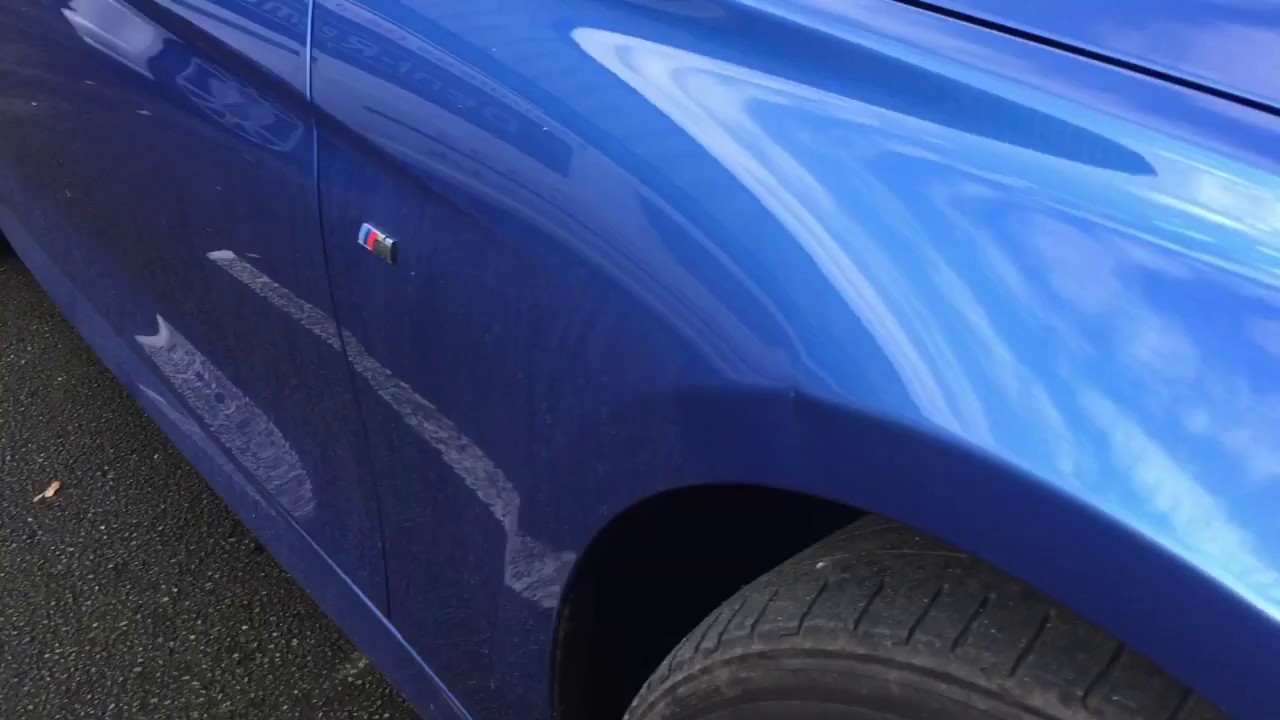 BMW wing damage - YouTube