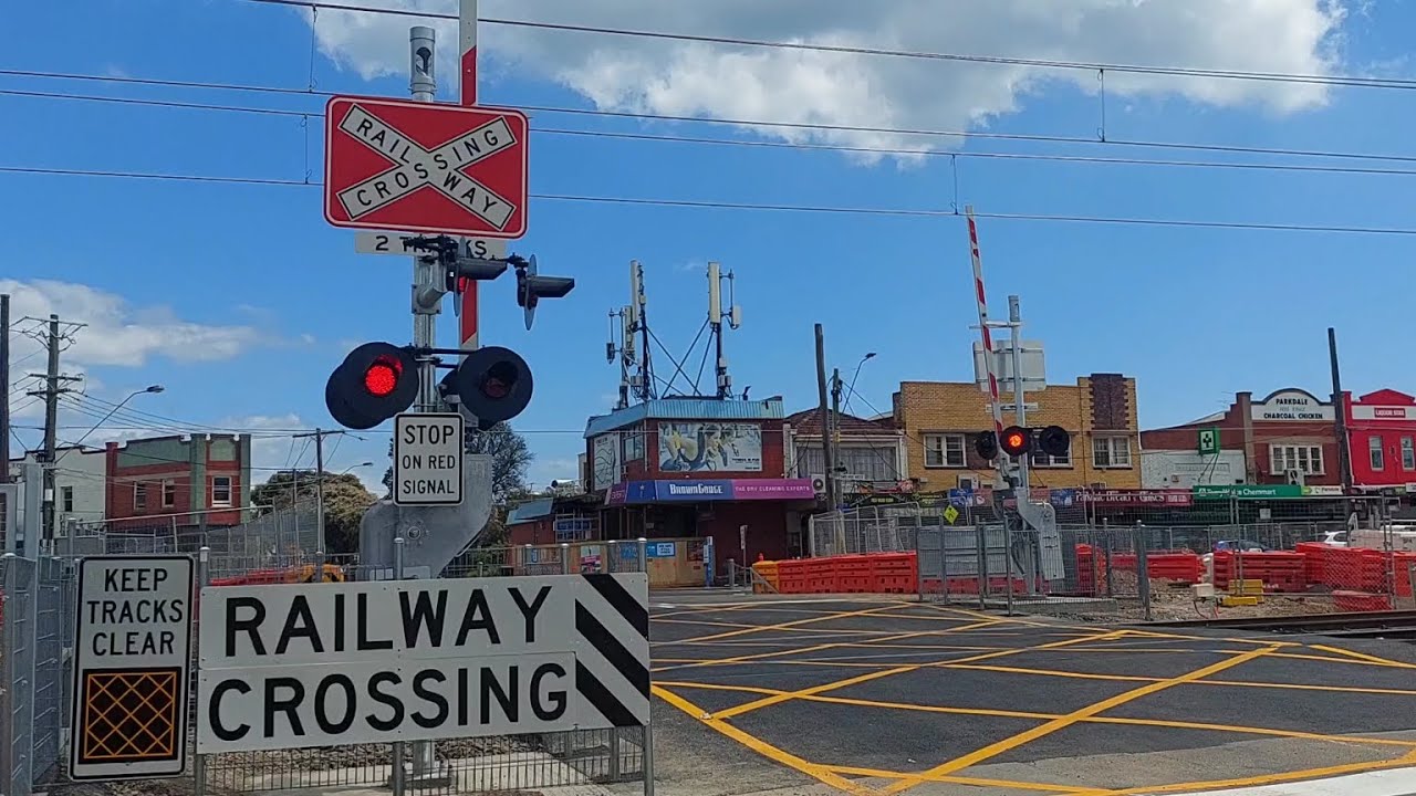 Comeng trains running through Parkdale temporary rail tracks and brand ...