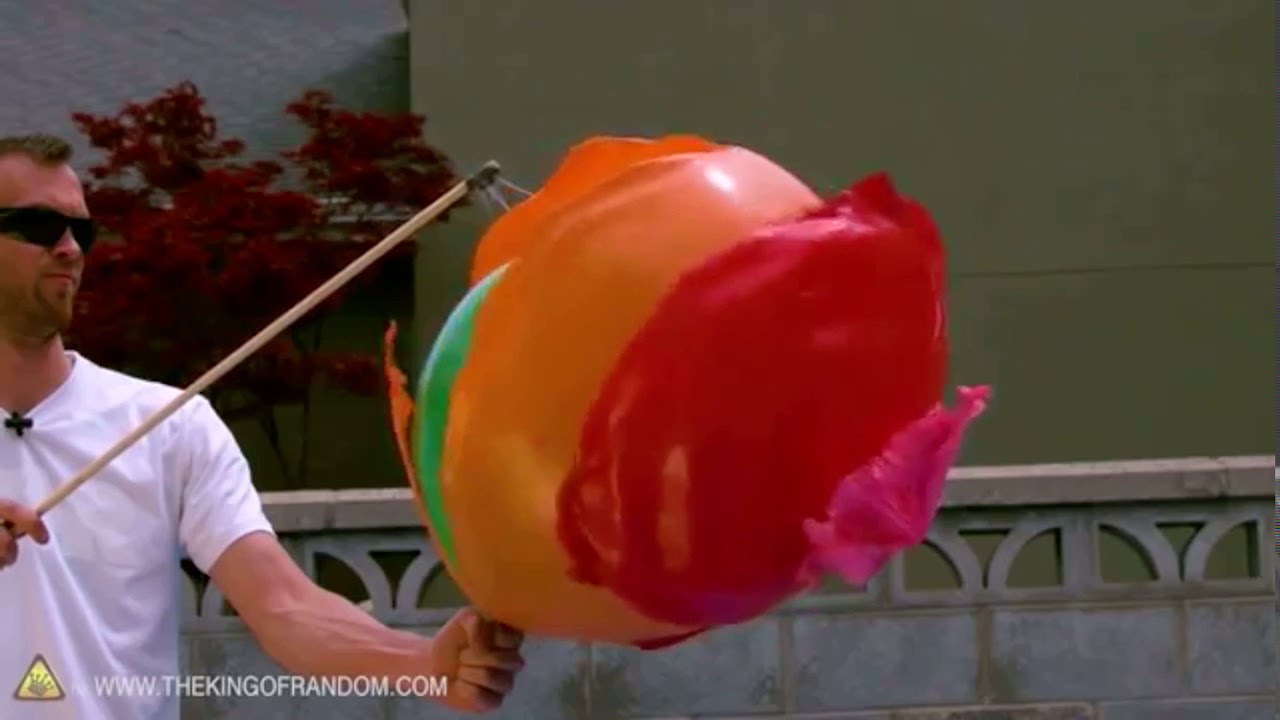 slow motion baloon pop - YouTube