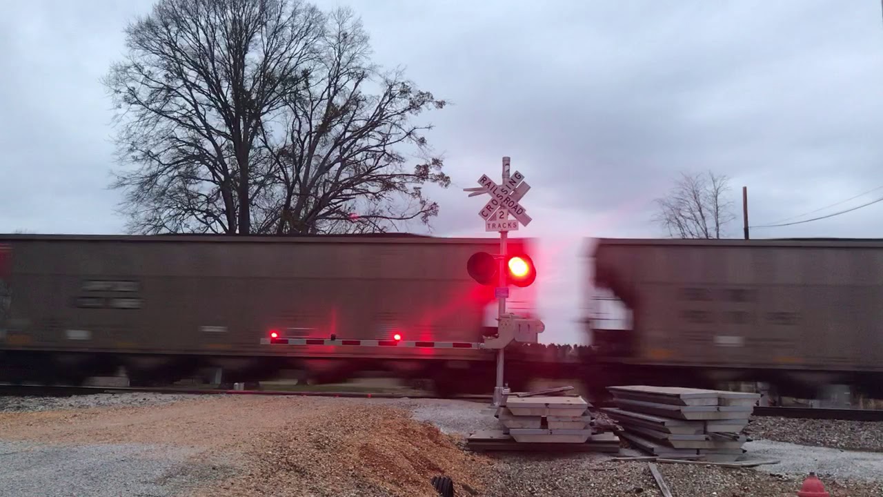 2 CN engines push a fast BNSF coal train in Gattman, Ms - YouTube