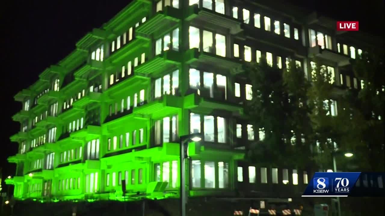 Santa Cruz County building lights up green for Veterans Day - YouTube