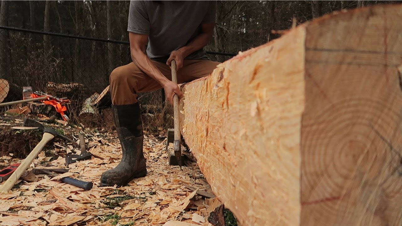 Hand hewing a log - YouTube