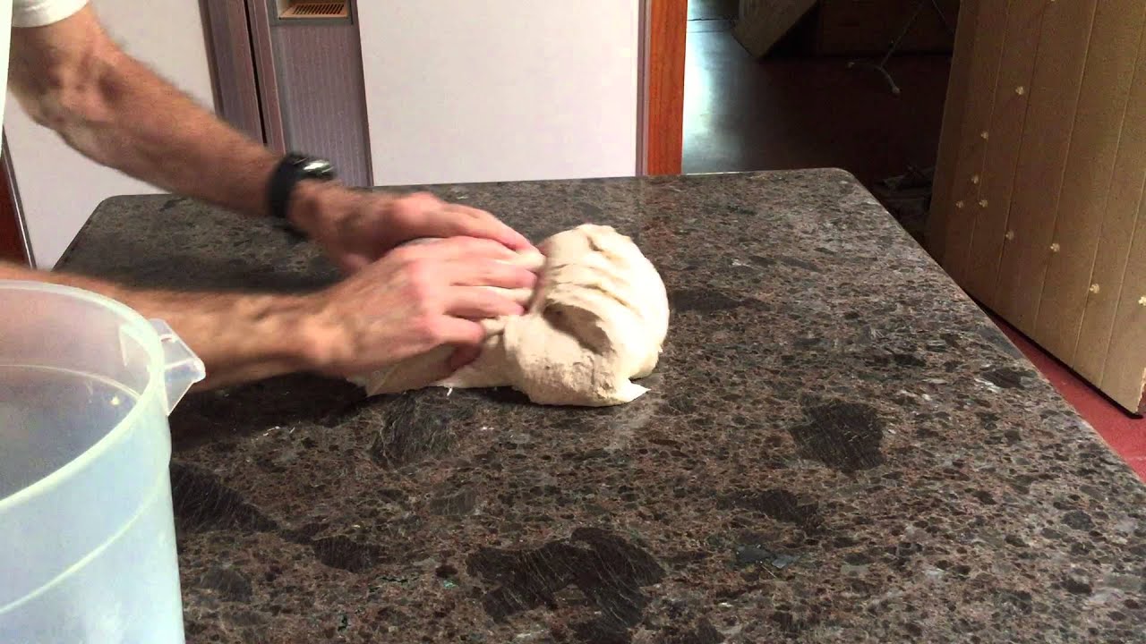Folding my sourdough bread dough at 100 minutes - YouTube