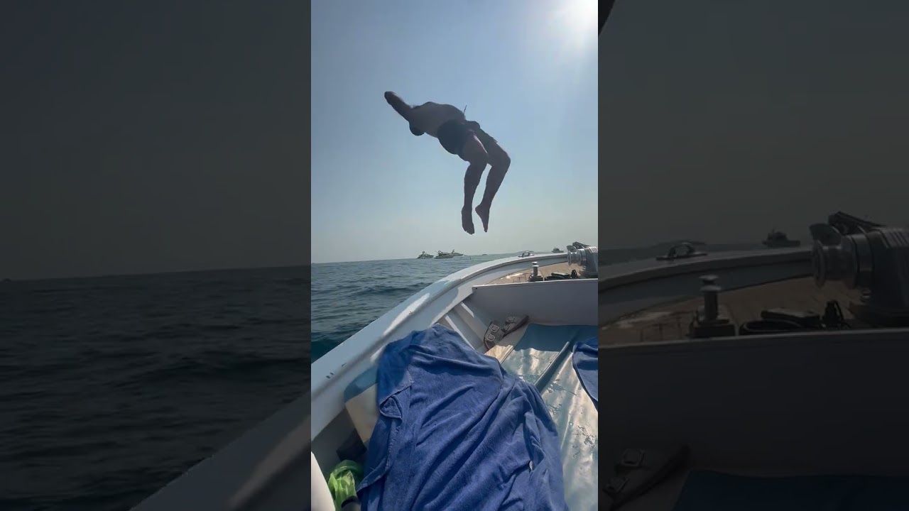 Guy does backflip from boat then bumps head on edge and falls into ...
