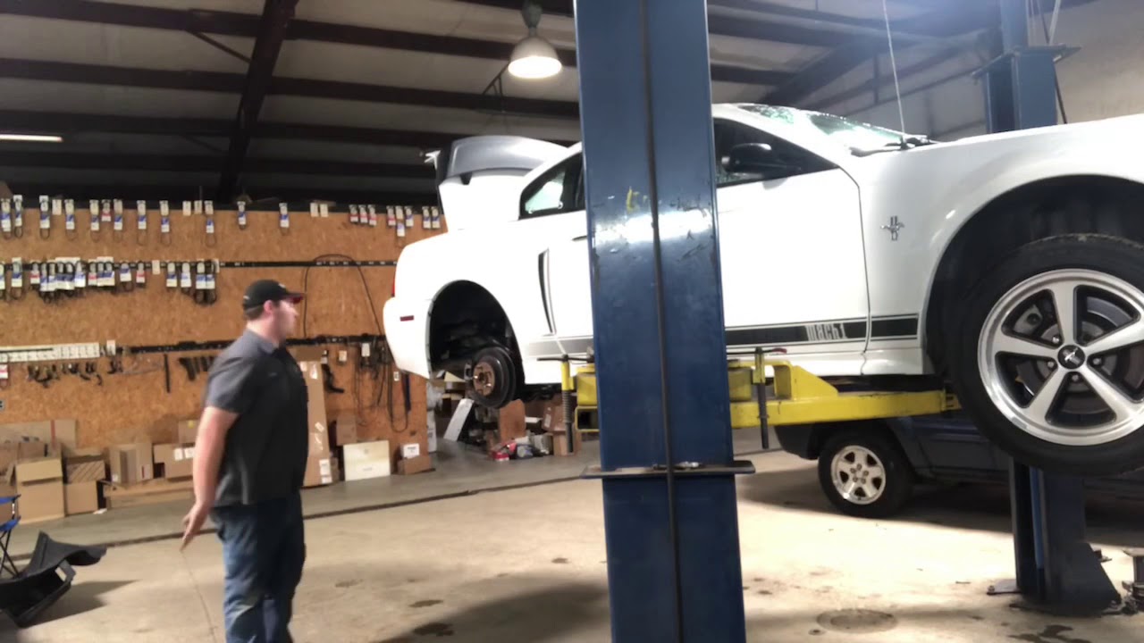 Rear shock replacement 2003 Mach 1 - YouTube