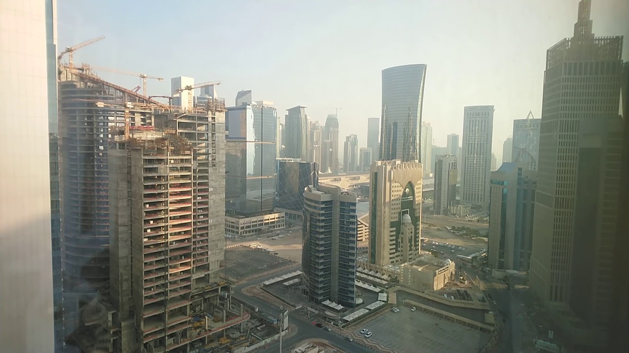Doha corniche city view high rise building view alfardan tower - YouTube
