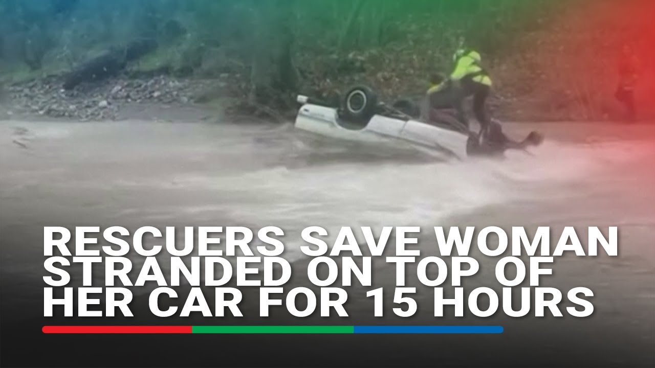 Rescuers save woman stranded on top of her car for 15 hours - YouTube