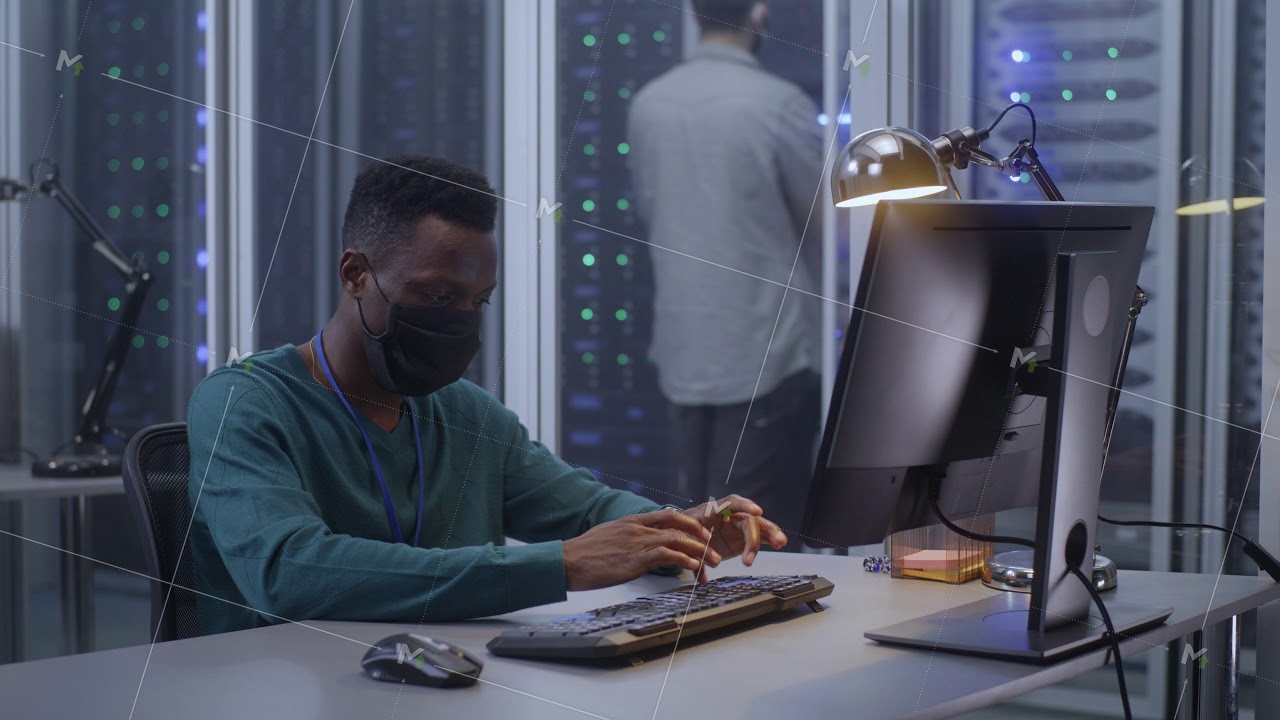 Young man working in data center - YouTube