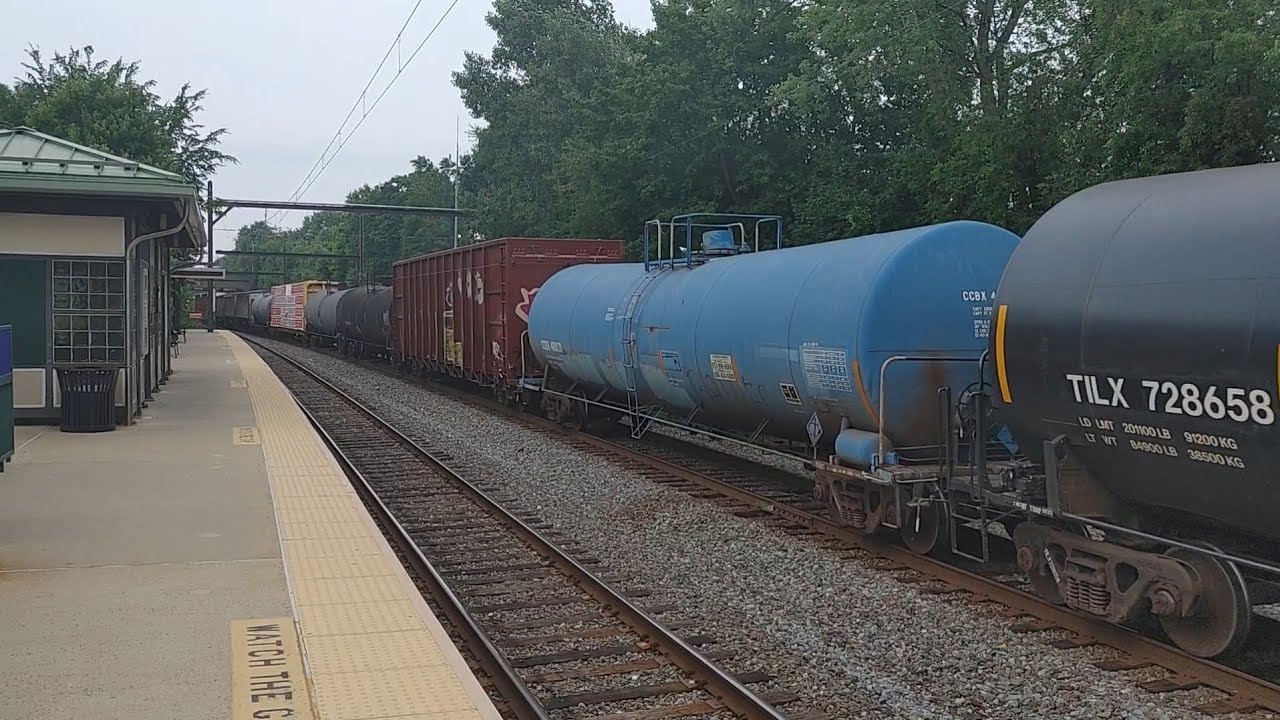 CSX M403 with a blue tank car at Olney Pa. - YouTube