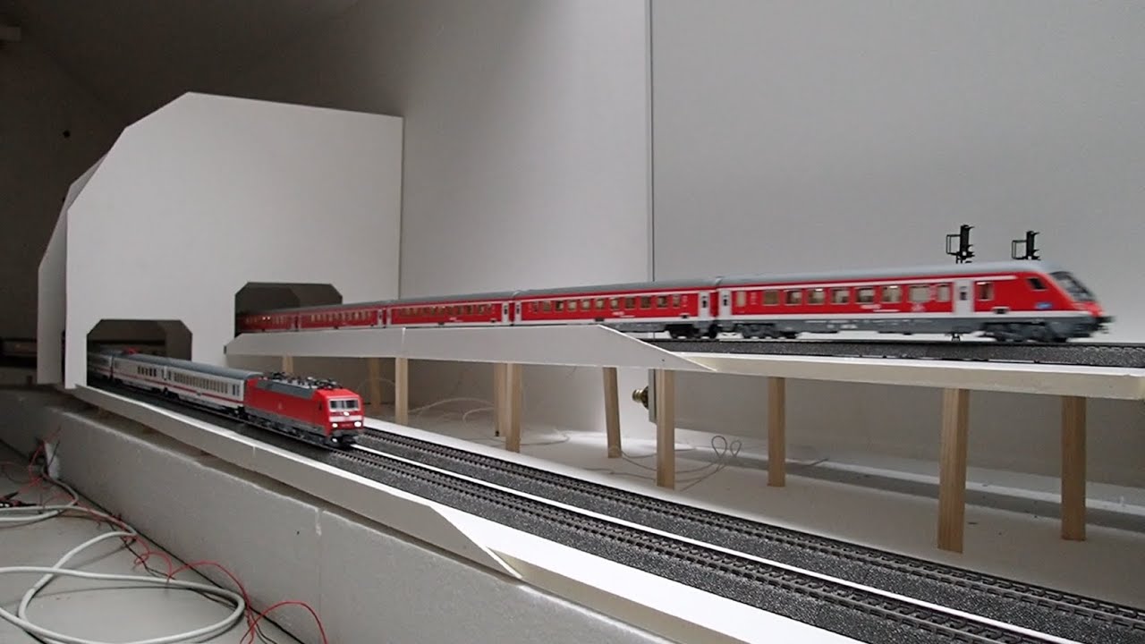Regional Express train running along the layout passes InterCity train ...