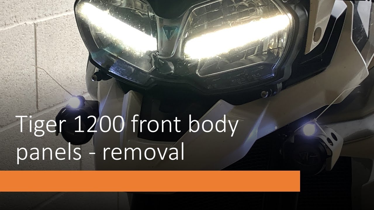 Triumph Tiger 1200 tank plastic removal - YouTube