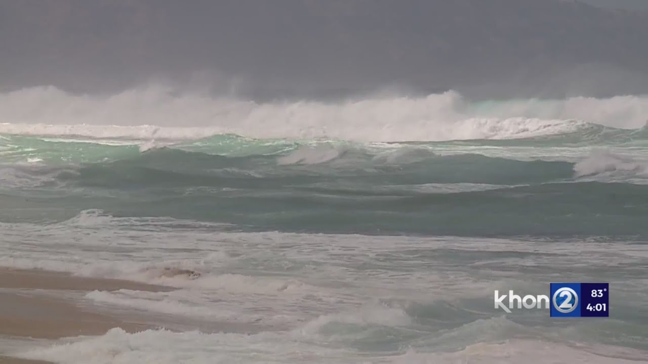 High surf warning has lifeguards busy as swells continue to roll in ...