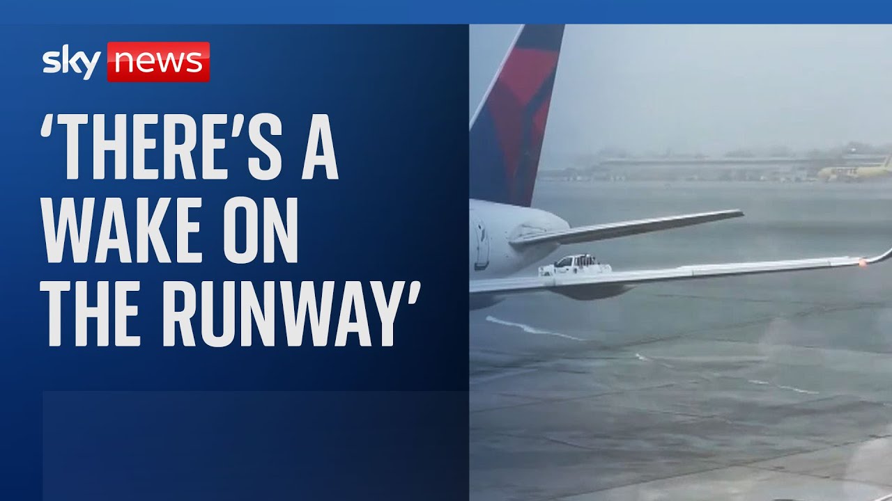 Waves on the runway as planes are grounded by Florida flooding - YouTube