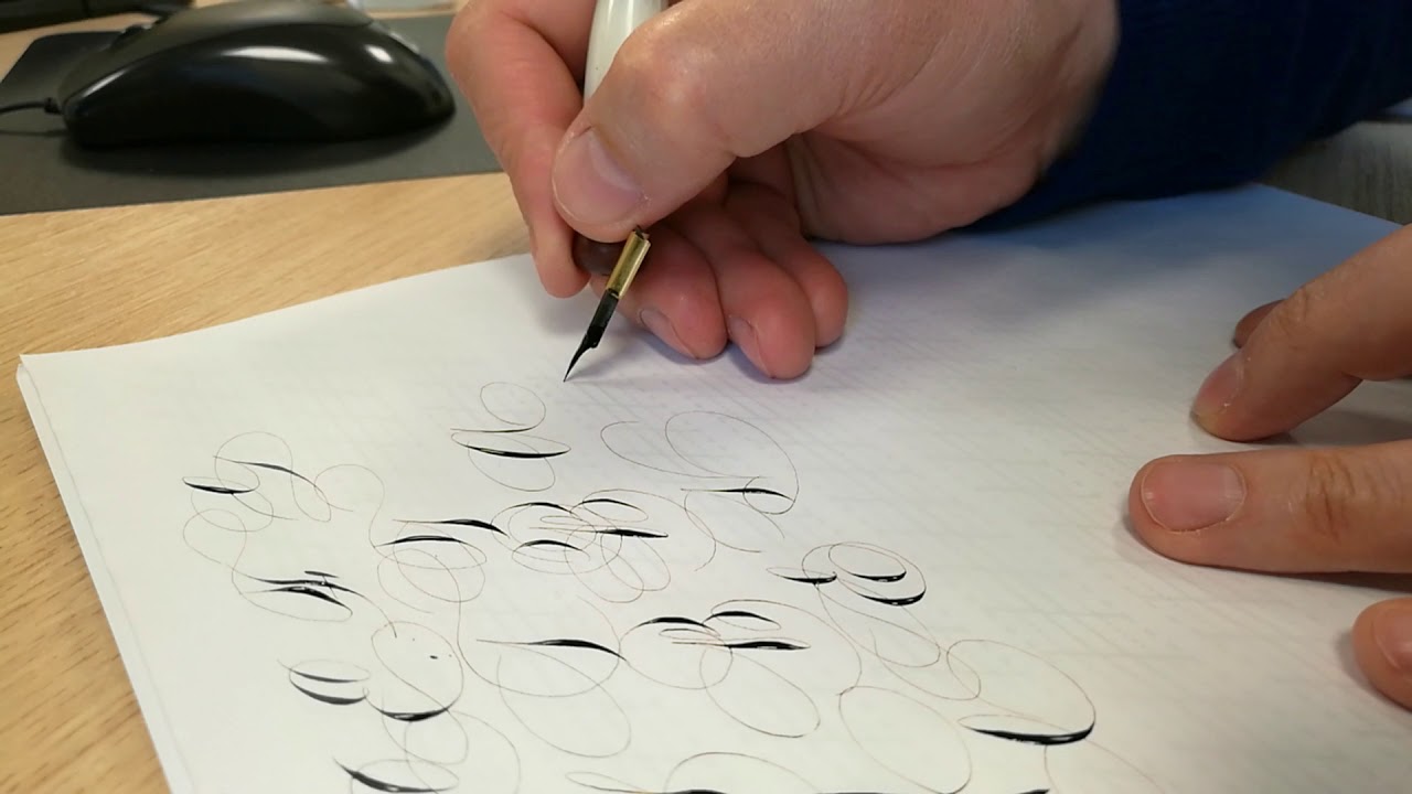 George Marin calligraphy - YouTube