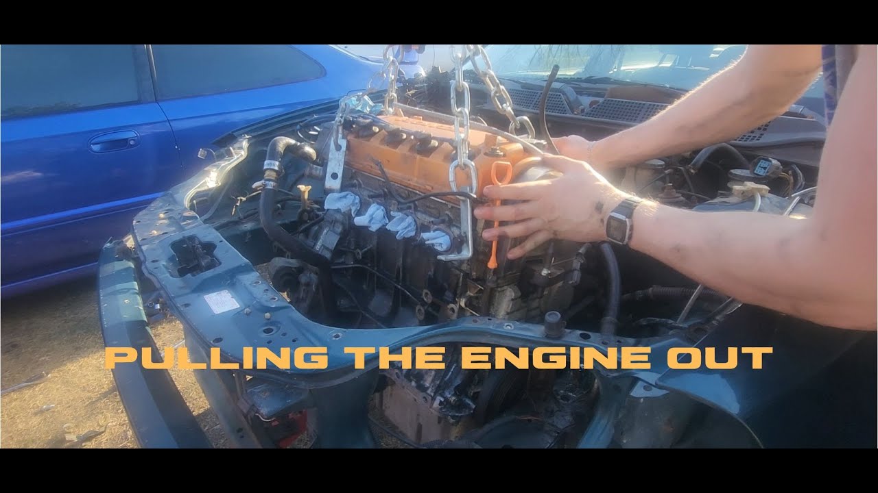 Pulling the D16 out of the old ripper - YouTube