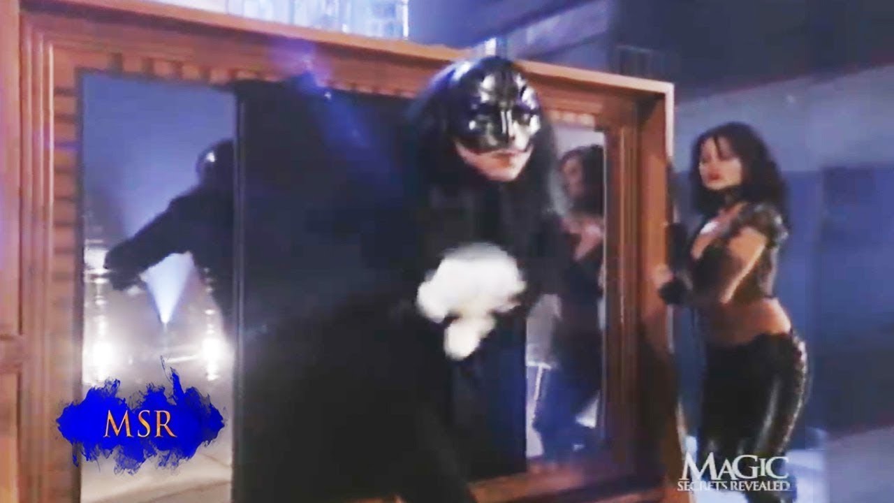 MAGICIAN PASSES THROUGH SOLID MIRROR! - YouTube