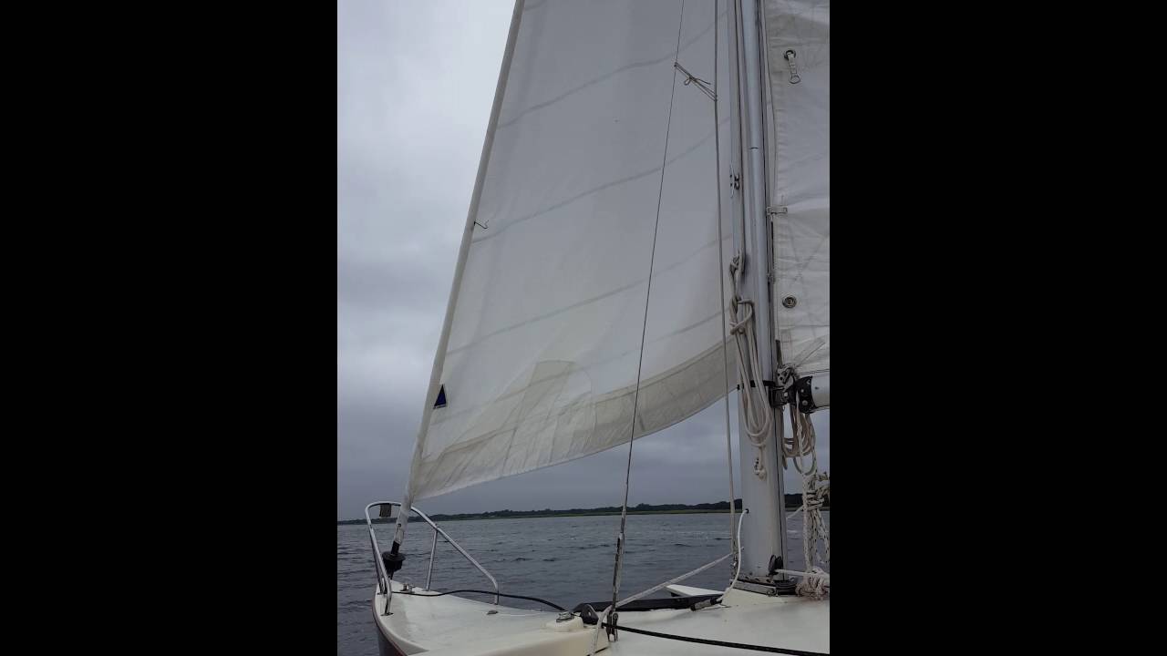 Unfurling the jib on the Marples 26 design constant camber Trimaran ...
