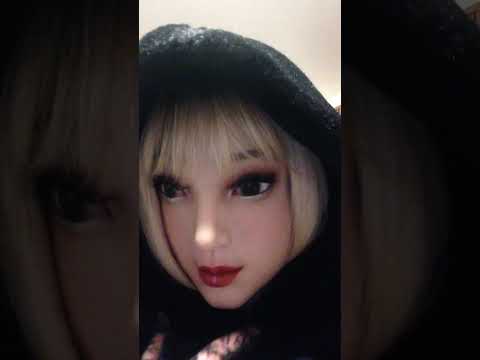 Leather thigh boots in hotel room with doll face female silicone mask (Part 1).