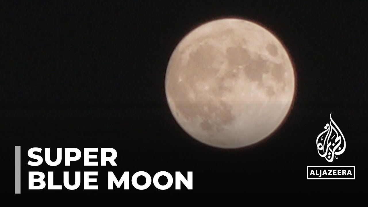 Super blue moon: Rare lunar event dazzles stargazers - YouTube