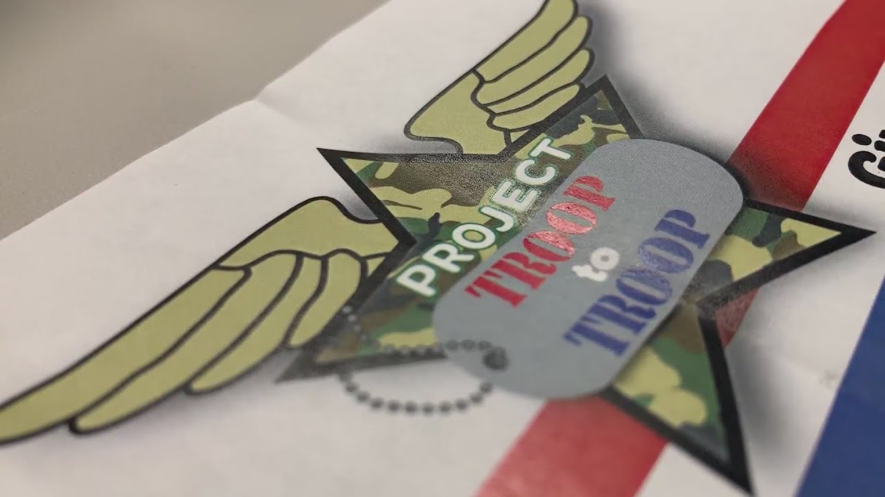 Girl Scouts sell cookies for soldiers - YouTube