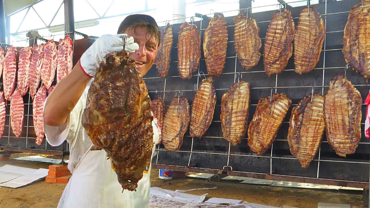 Huge Pyramidal Grills of Ribs, Argentinian Asado, Cheese on Meat. Italy ...