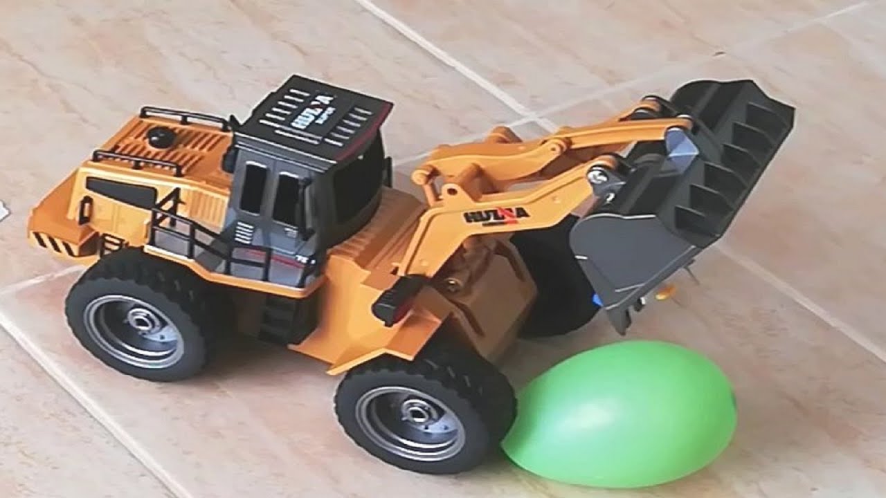 RC Loader Popping Balloons | Construction Vehicles for Children - YouTube