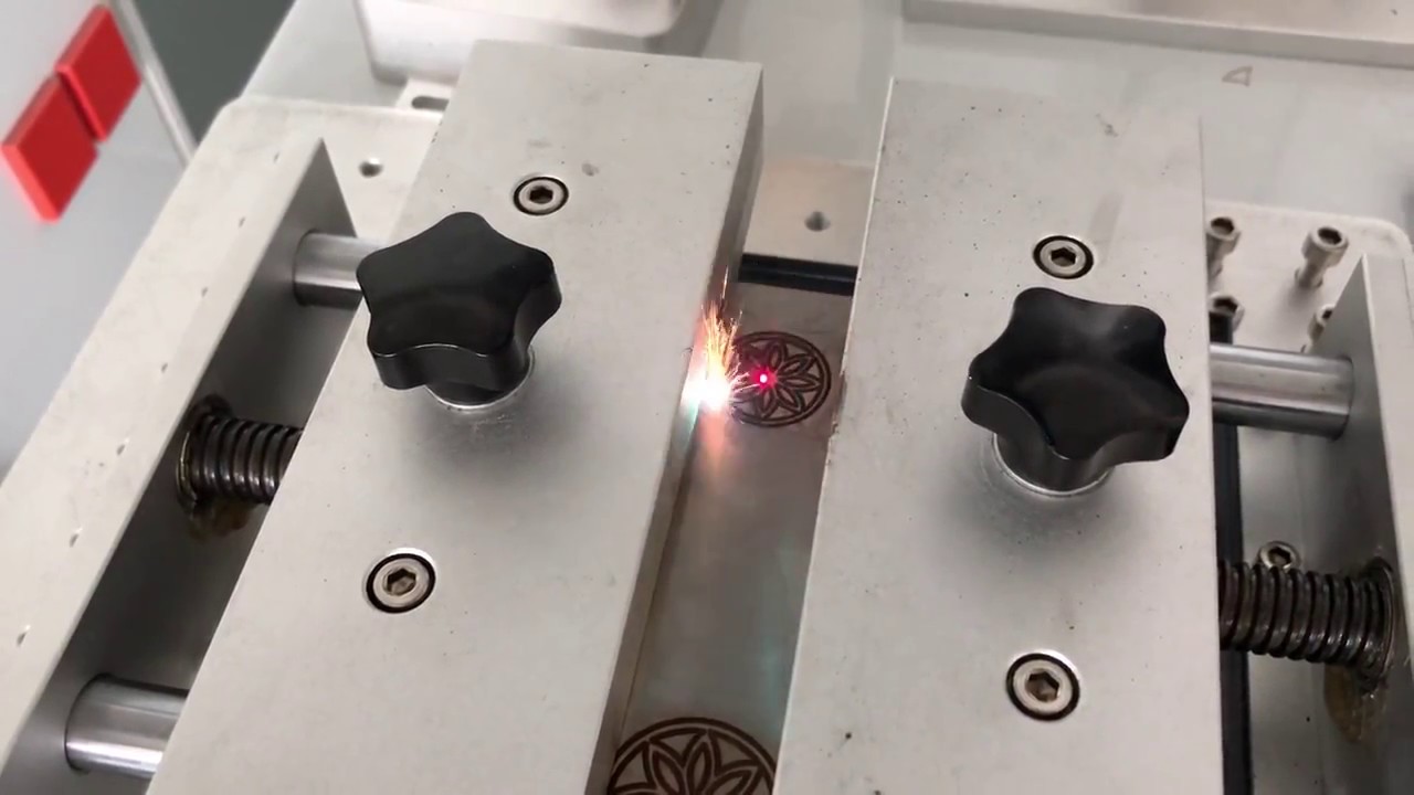 Fiber laser cutting fixture test - YouTube