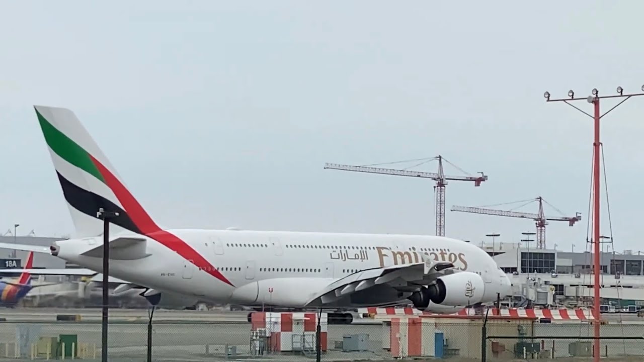 Emirates taking off from the airport - YouTube