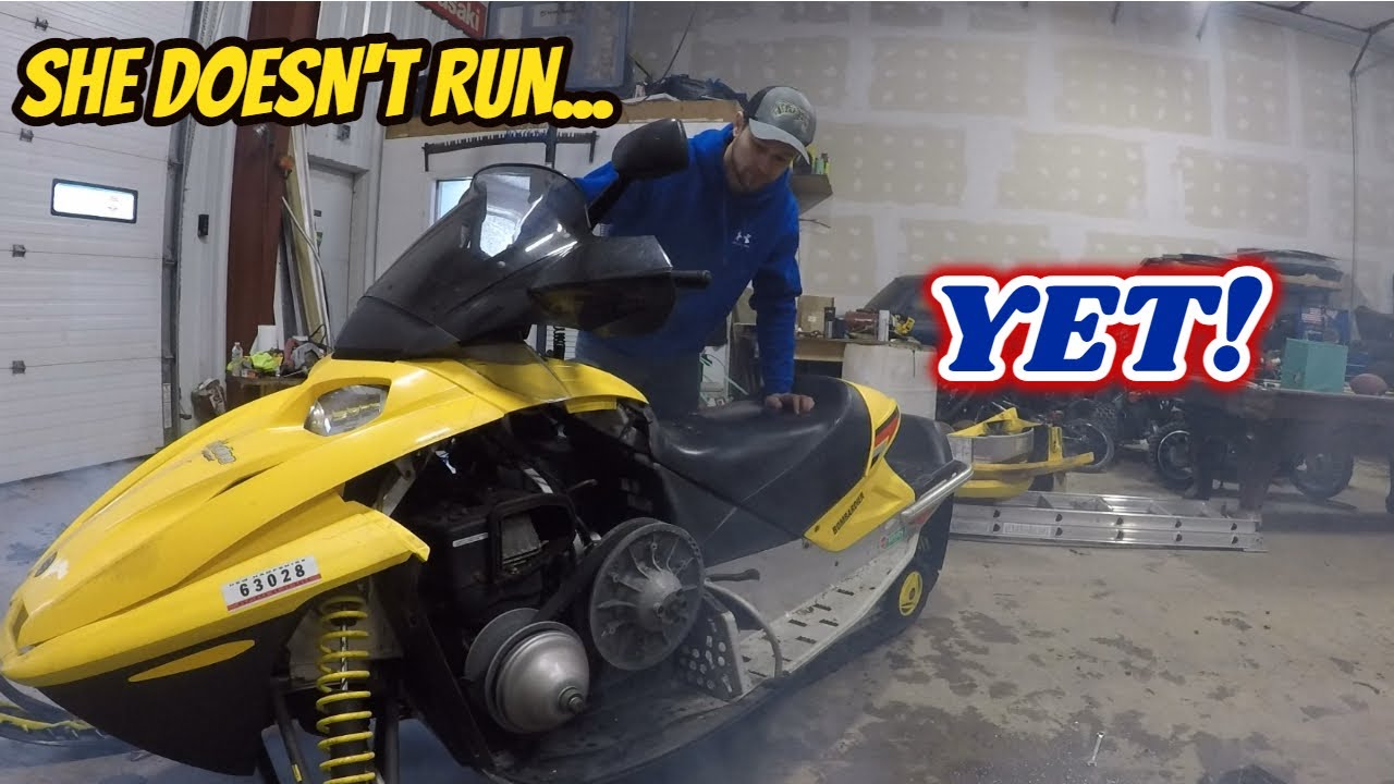 FIXING A SNOWMOBILE - YouTube