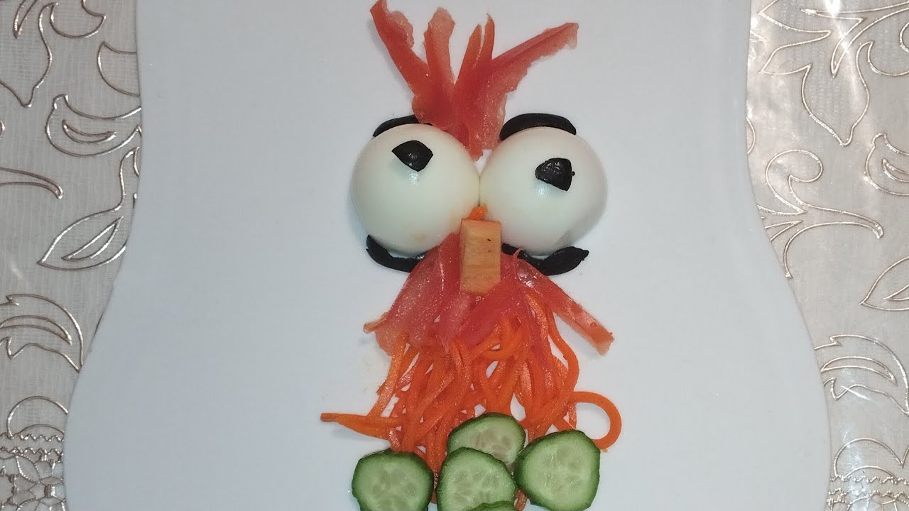 Make an image of a rooster from Pamidor, cucumbers and eggs and other ...