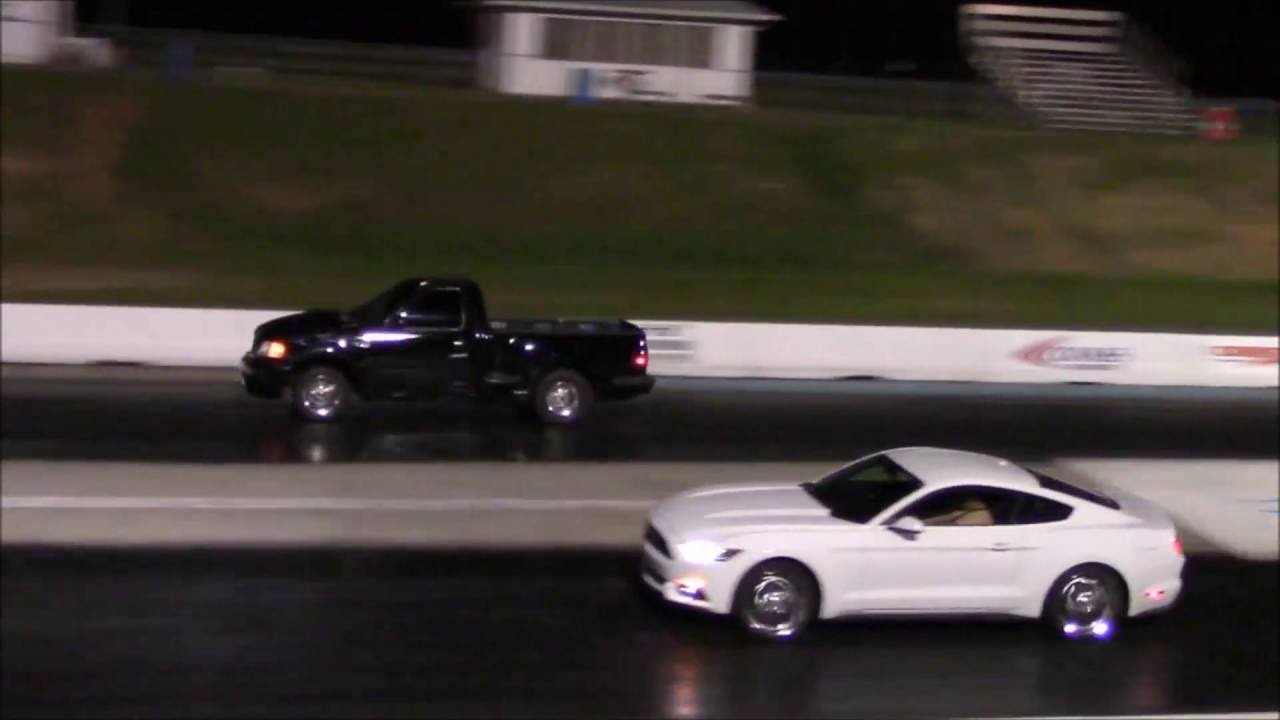 Ford Lightning Drag Races against S550 Mustang - YouTube