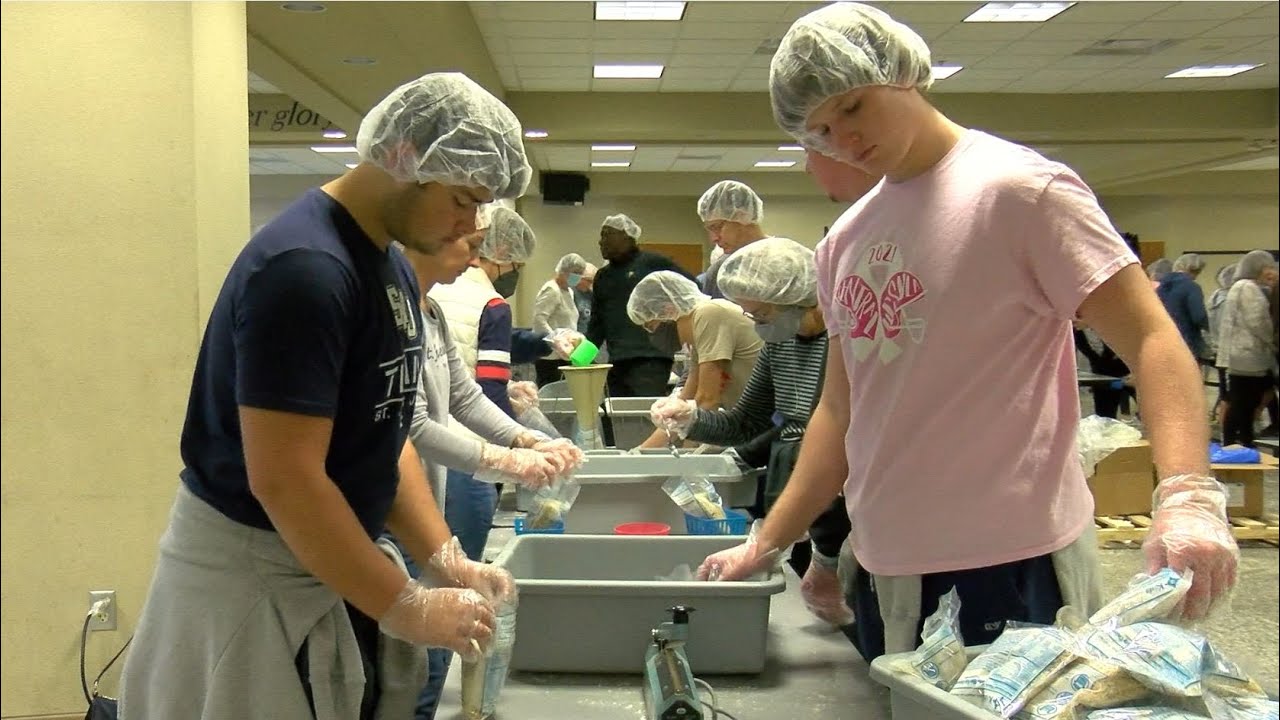Community food build volunteers package 60,000 meals for families with ...