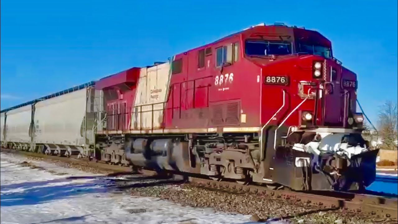 ULTRA RARE! CP EX Olympic unit #8876 leading and CP heritage unit at rear CP freight train at ...