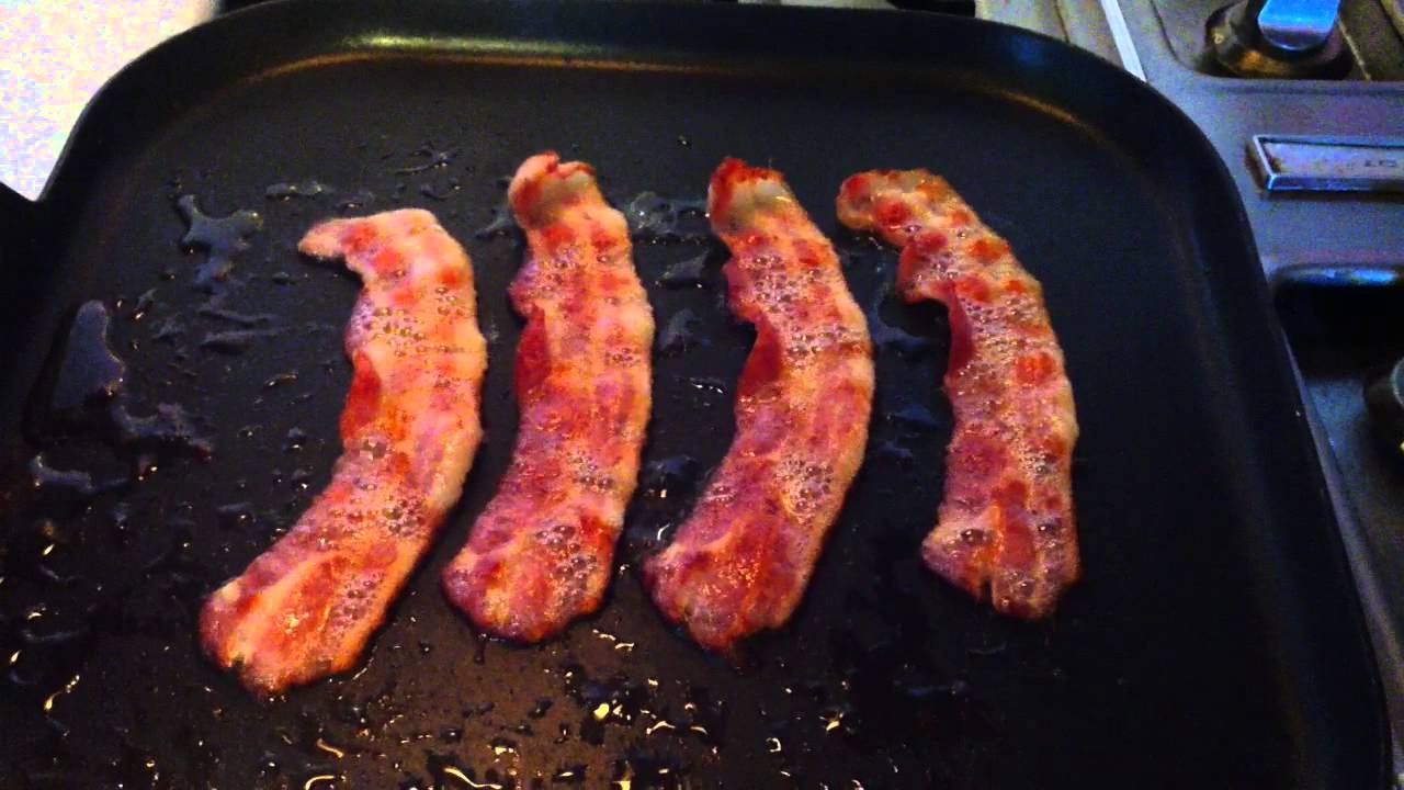 Tantalizing sound of sizzling frying Bacon or sound of packaged Hostess ...