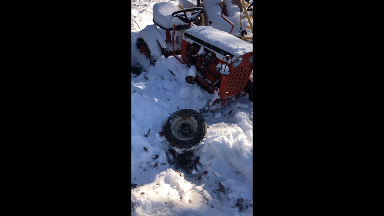 Case 130 and Colt 2712 lawn tractors pulled from a snowy field. - YouTube