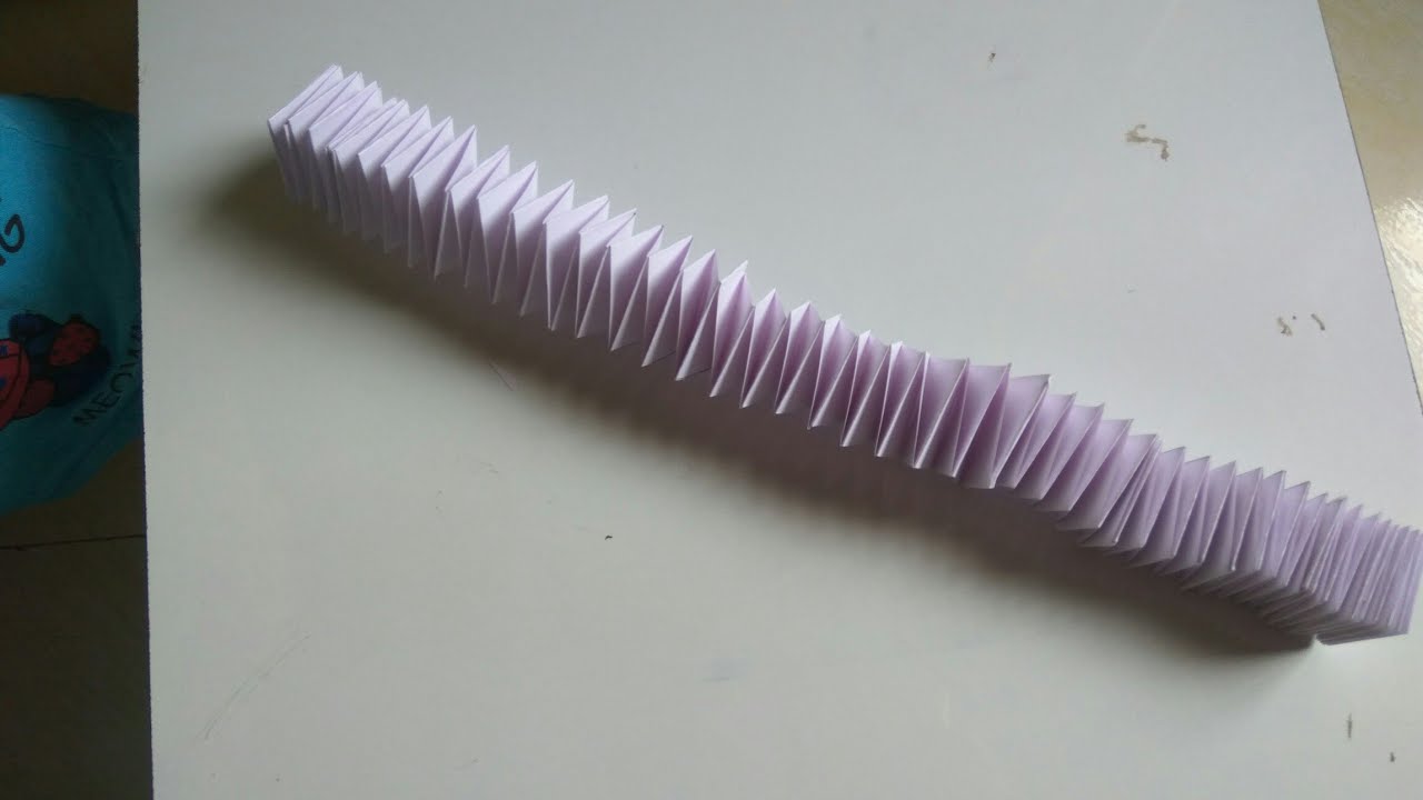 Paper spring toy - YouTube