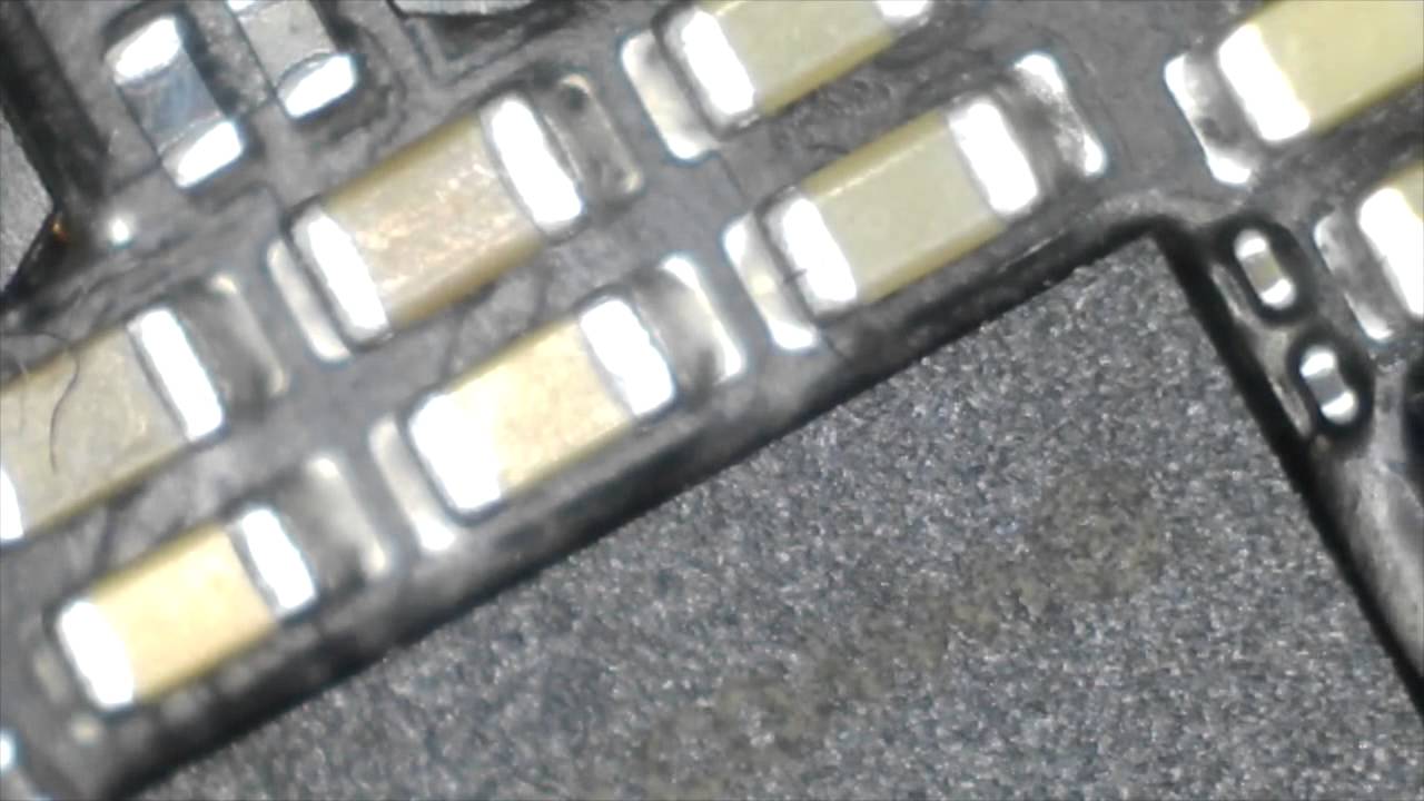 Under the Scope: iPhone 4 motherboard under a microscope - YouTube