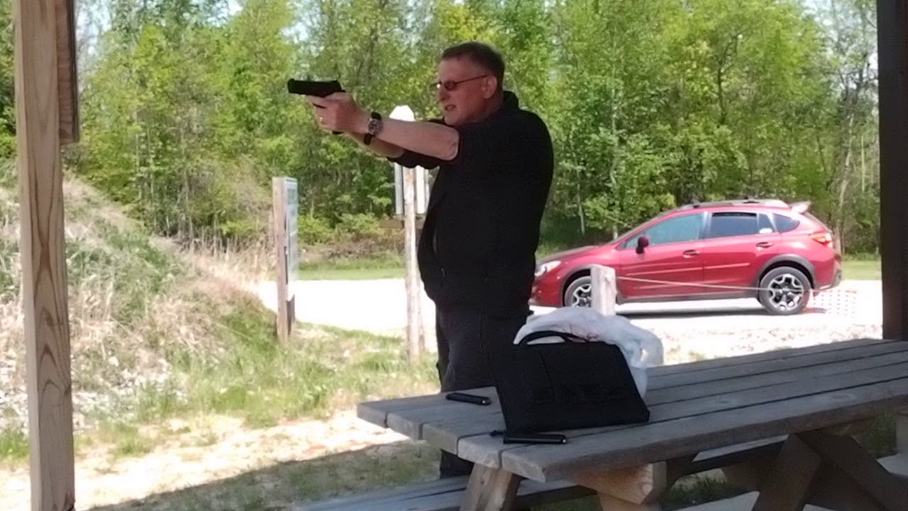 Chip McCormick 8 round Power Mags through Taurus 1911 Commander - YouTube