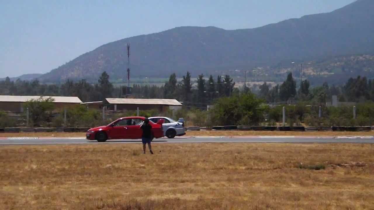 Evo VIII (red) vs Evo V (gray) | Drag Race | by CanalPlus - YouTube