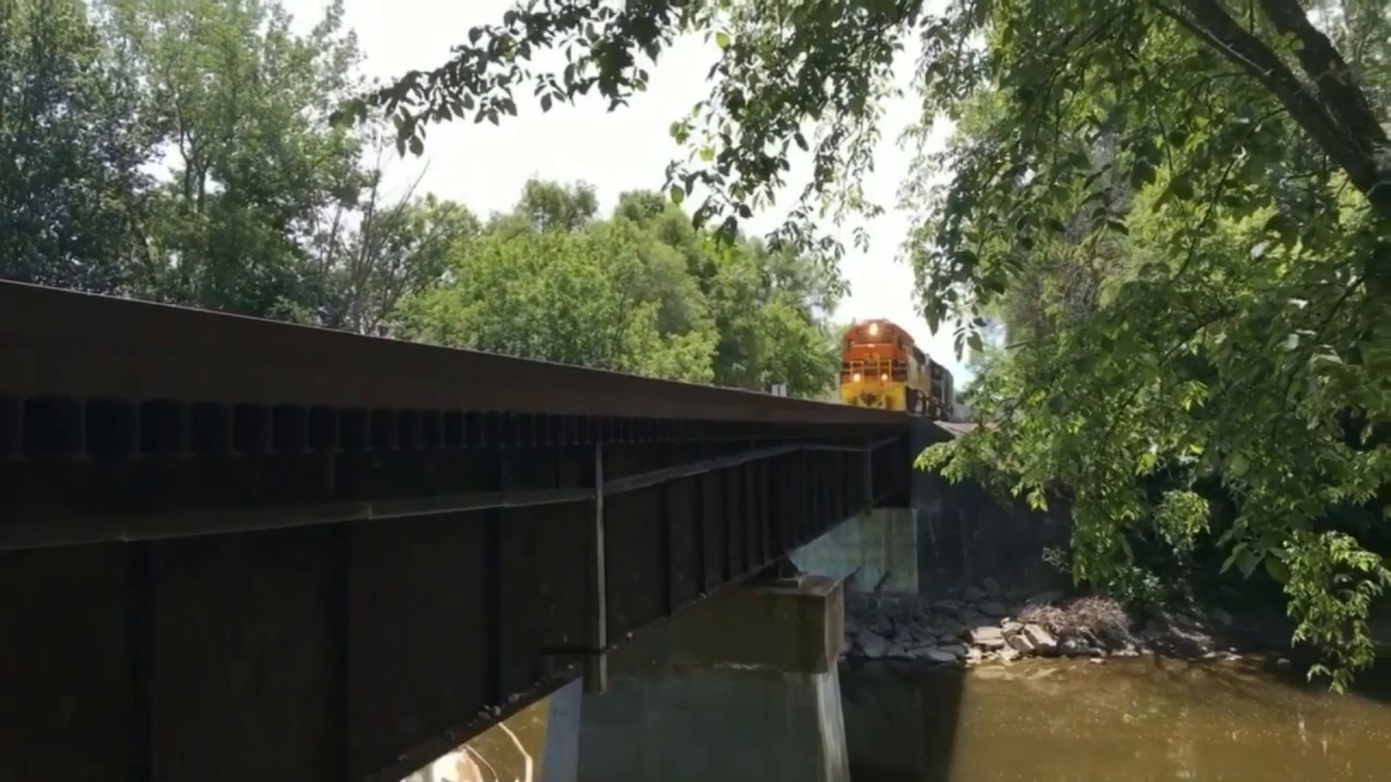 Train crossing 118 year old bridge near Vassar, MI. - YouTube