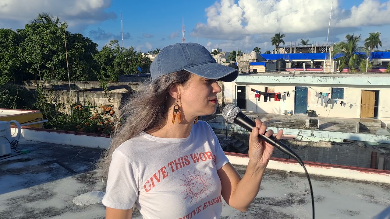 Toni Murdock sharing love with the island of Cozumel (rooftop) - YouTube
