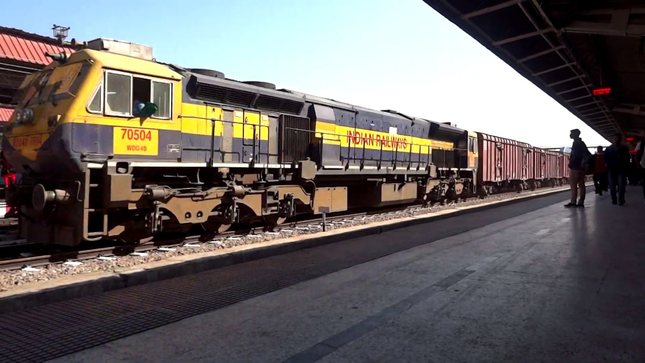 [IRFCA] WDG4D- BCNA Freight Train passing through busy Rangiya Junction ...