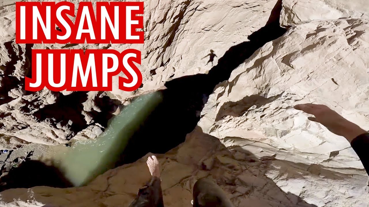 INSANE CLIFF JUMPS INTO NARROW CANYON - YouTube
