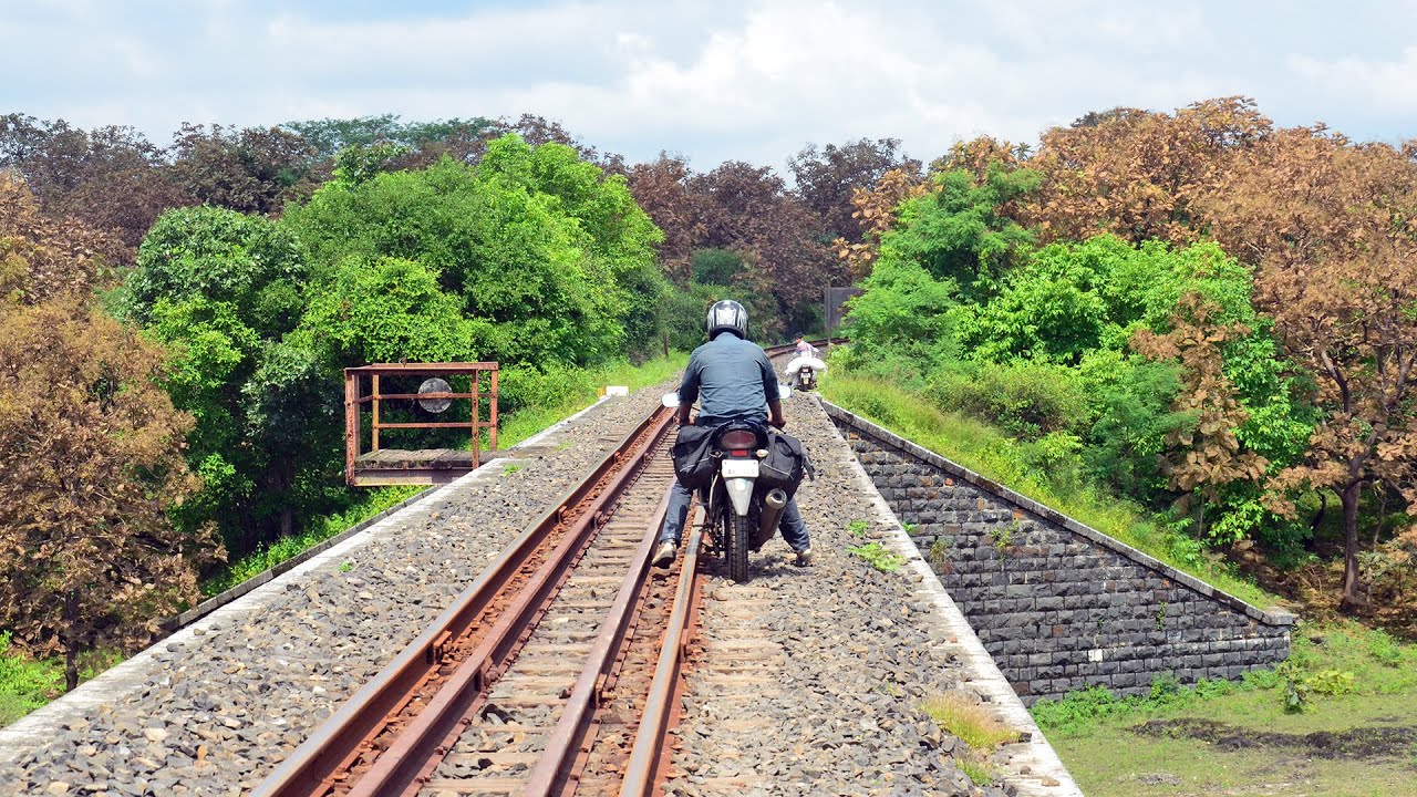 Riding Motorcycle on the Railway Track across Gir National Park - YouTube