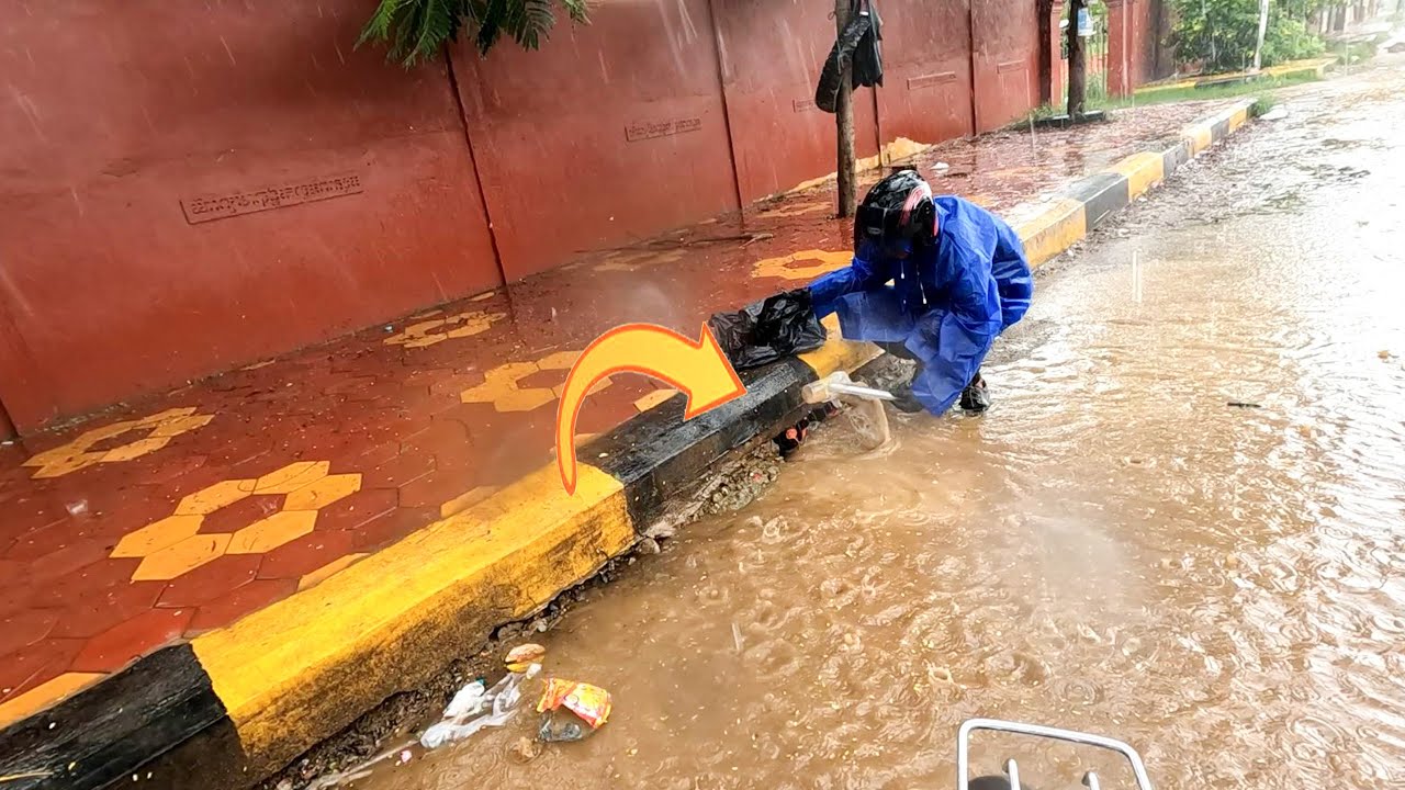 Unclogging Drain During Raining With Lots Of Debris Stuck In Drain - YouTube