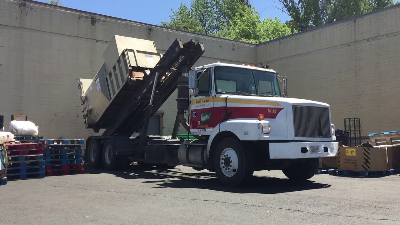 WhiteGMC WG • Amrep Roll Off Garbage Truck - YouTube