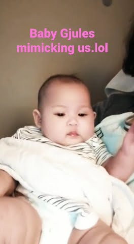 baby trying to mimick us and making funny sounds. Don't mind her baby ...