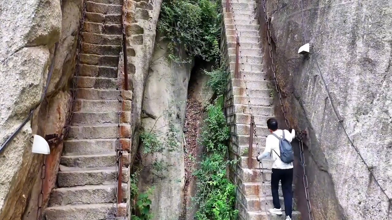 A Thousand Foot Building andaHundred Foot Gorge on Mount Huashan,a must ...